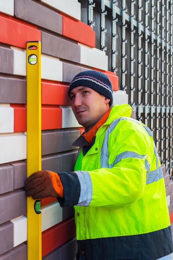 The Builder Checks the Quality of the Work Done, Keeping the Water ...
