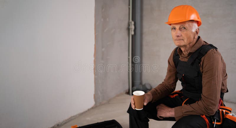 Builder with Coffee. Elderly Engineer or Construction Worker Relax on ...