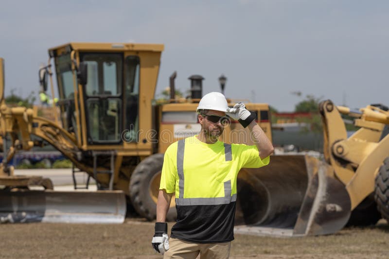 Builder Construction Man. Worker Supervisor at Heavy Machinery ...