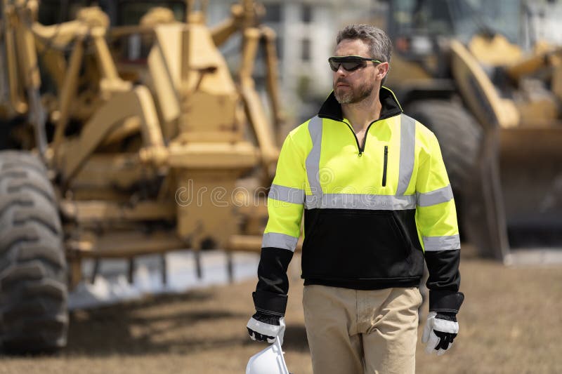 Builder Construction Man. Worker Supervisor at Heavy Machinery ...
