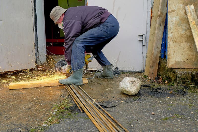 Builder Cuts Metal Cutting Machine Stock Image - Image of metallic ...