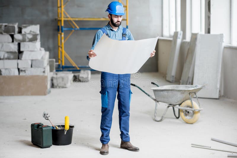 Builder at the Construction Site Stock Image - Image of craftsman, plan ...