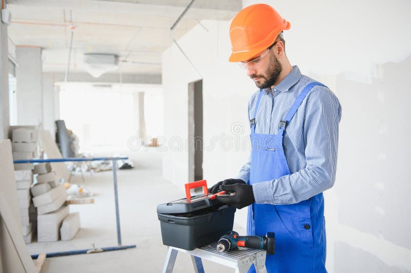 Builder on Construction Site with Tool Box Stock Image - Image of hand ...