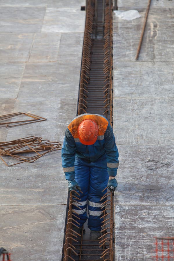 Builder on Construction Site Wearing Helmet Uniform Works Stock Image ...
