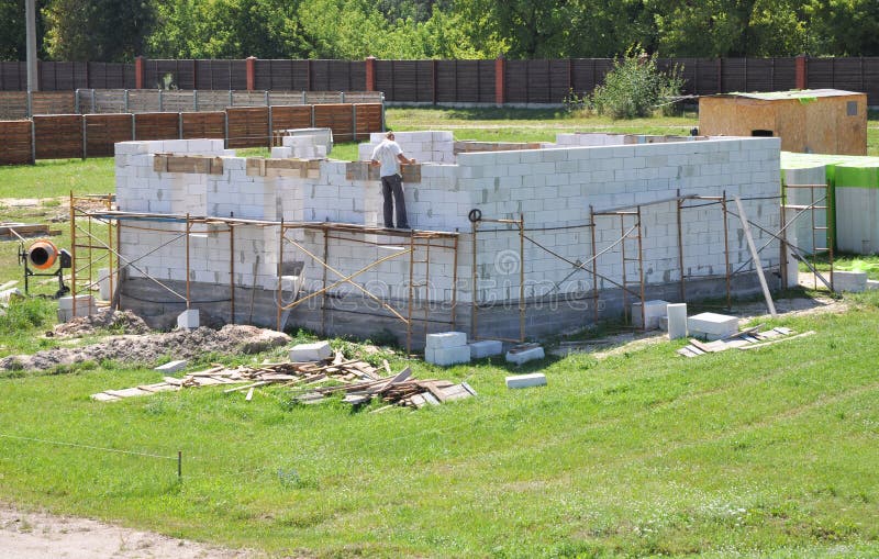 Builder Contractor Laying House Wall from White Aerated Concrete Blocks ...