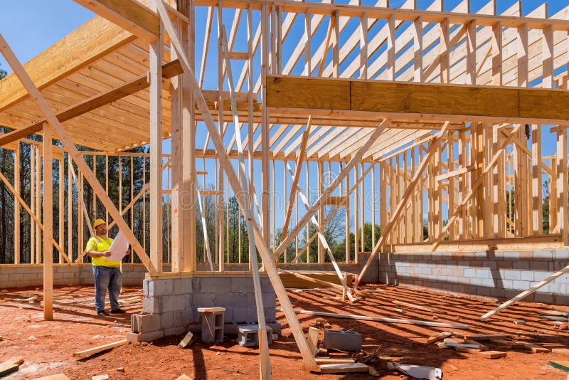 Builder Contractor Using Architecture Blueprint Plan during ...