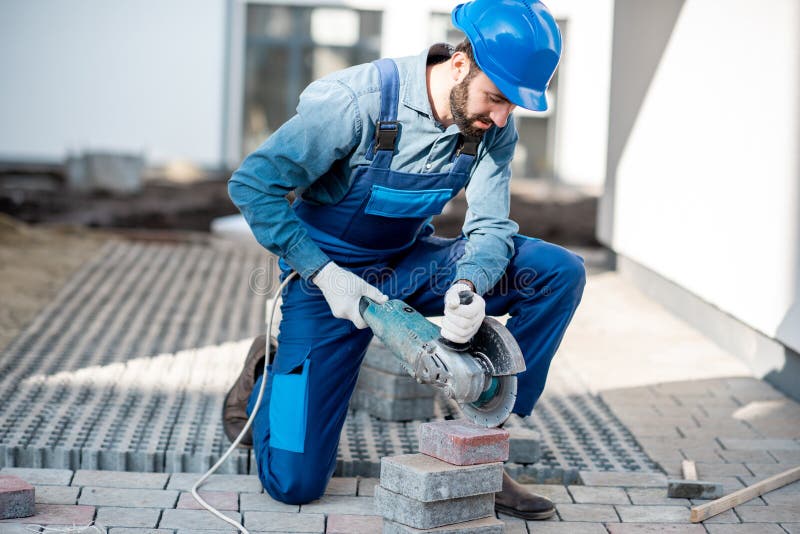 Builder Cutting Paving Tiles Stock Image - Image of stone, equipment ...