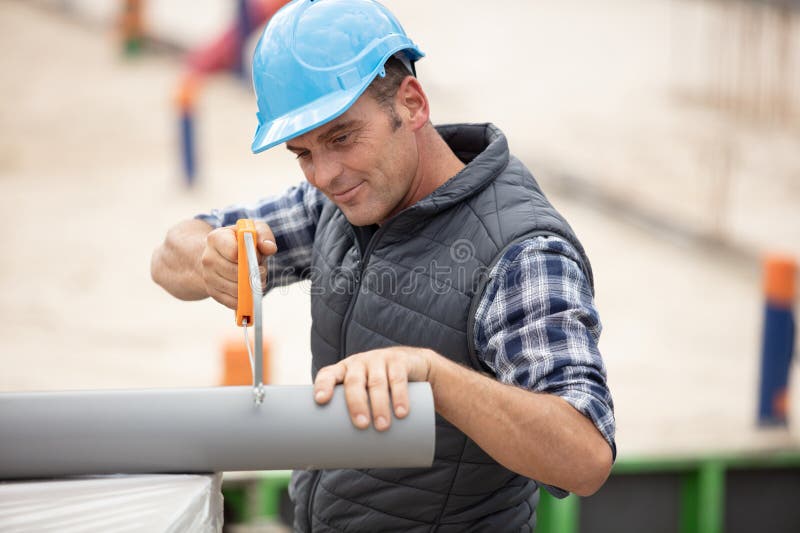 Builder Cutting Pvc Pipe with Saw Stock Image - Image of sawing ...