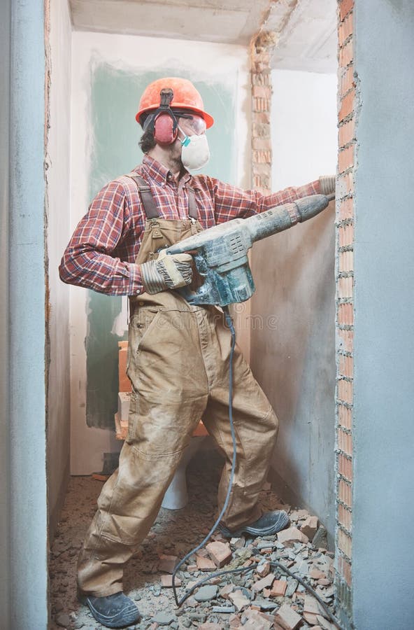 Worker with Demolition Hammer Breaking Interior Wall Stock Image ...