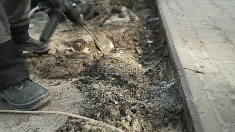 Builder Drills a Hole in the Wall with a Hammer Drill Stock Footage ...
