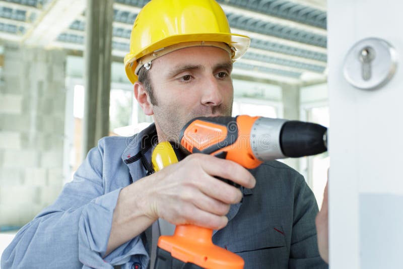 Builder Drills Wall with Drill Stock Image - Image of electrician ...