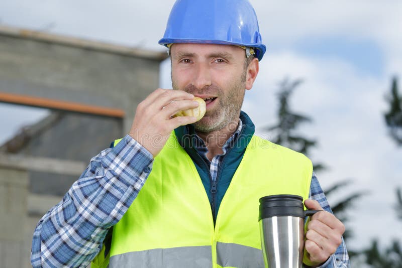 Builder Drinking Coffee and Eating Cake Stock Image - Image of yellow ...