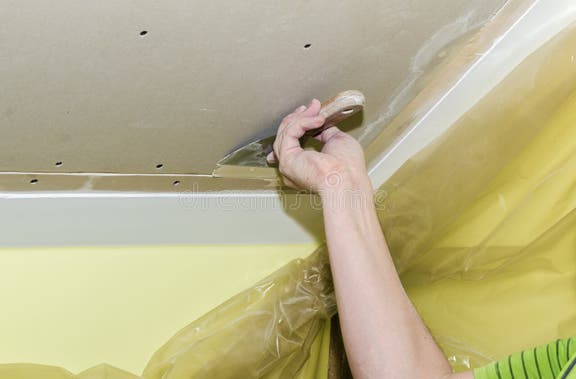 Puttying drywall seams stock image. Image of improvement - 86398657