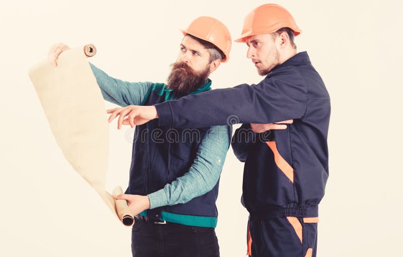 Builder, Engineer, Architect Work on Project. Men in Helmets Stock ...