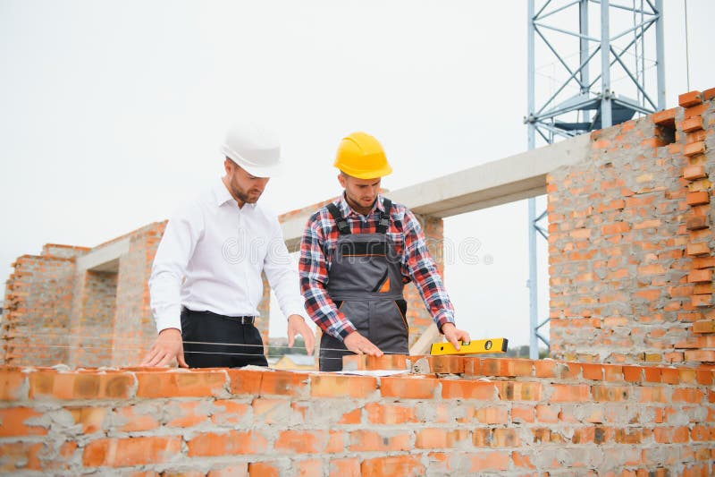 Builder and Engineer on Construction Site Stock Image - Image of ...