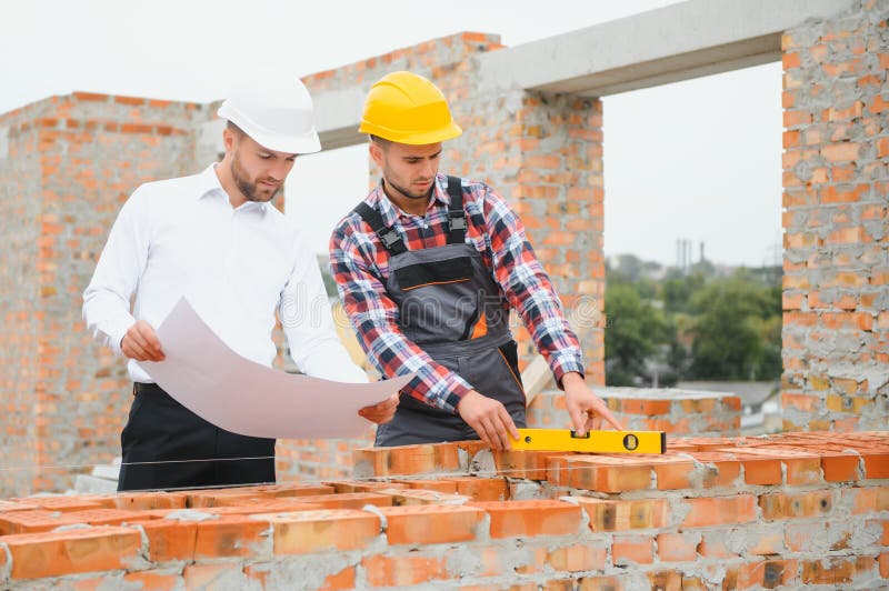 Builder and Engineer on Construction Site Stock Image - Image of ...
