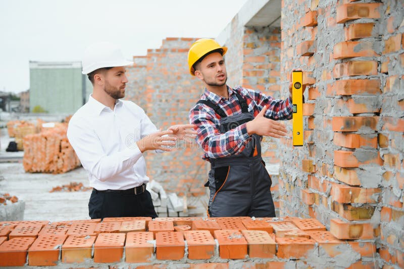 Builder and Engineer on Construction Site Stock Photo - Image of ...