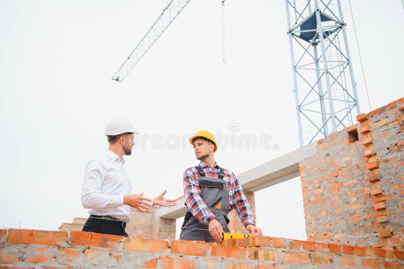 Builder and Engineer on Construction Site Stock Image - Image of hand ...