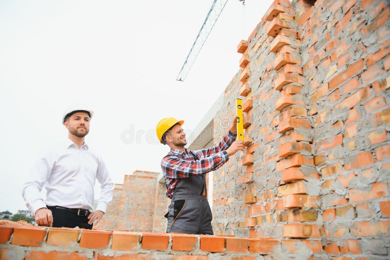 Builder and Engineer on Construction Site Stock Photo - Image of ...