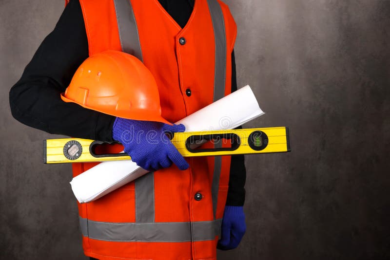Builder or Engineer in Special Uniform Holds Construction Level and ...