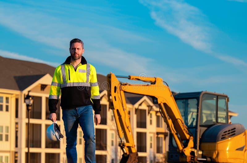Builder with Excavator for Construction at the Construction Site ...