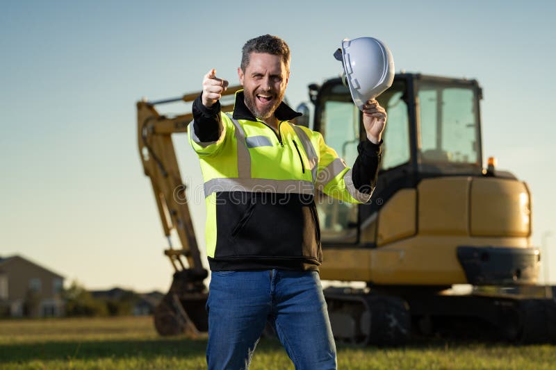 Builder with Excavator for Construction at the Construction Site ...