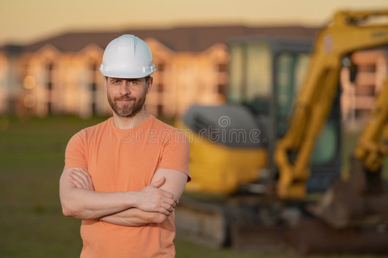 Builder with Excavator for Construction at the Construction Site ...