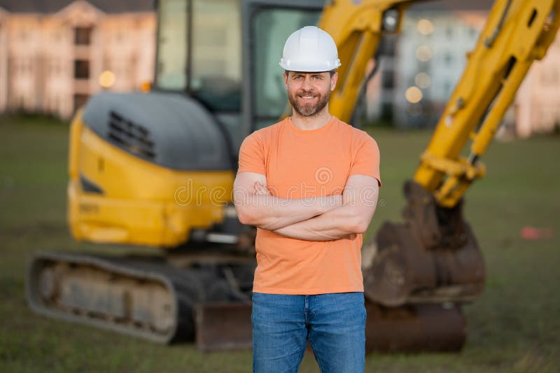 Builder with Excavator for Construction at the Construction Site ...