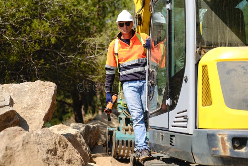 Builder Excavator Stones Helmet Sun Stock Photo - Image of work, helmet ...