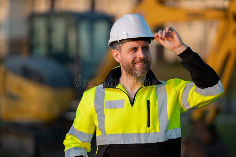 Builder on Excavator. Builder Worker with Excavator. Builder in Helmet ...
