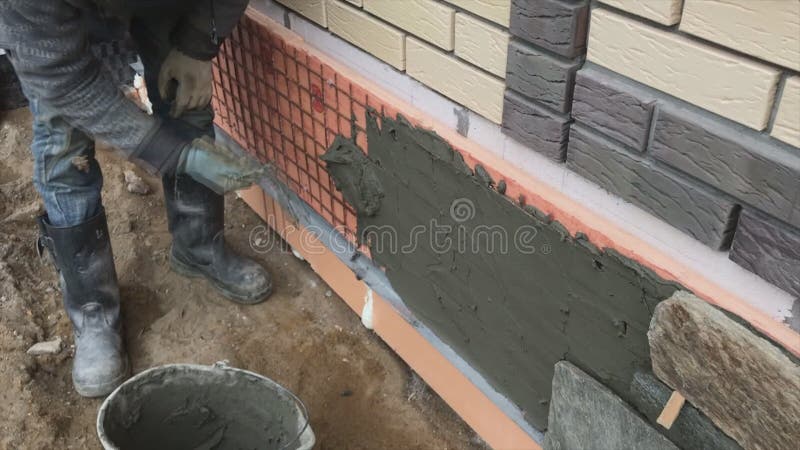 Builder Faces the Basement of a House with a Wild Stone. Flat for ...