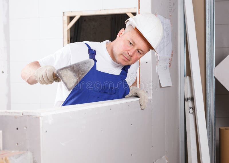 Builder Filling Gaps on Drywall Element Stock Image - Image of board ...