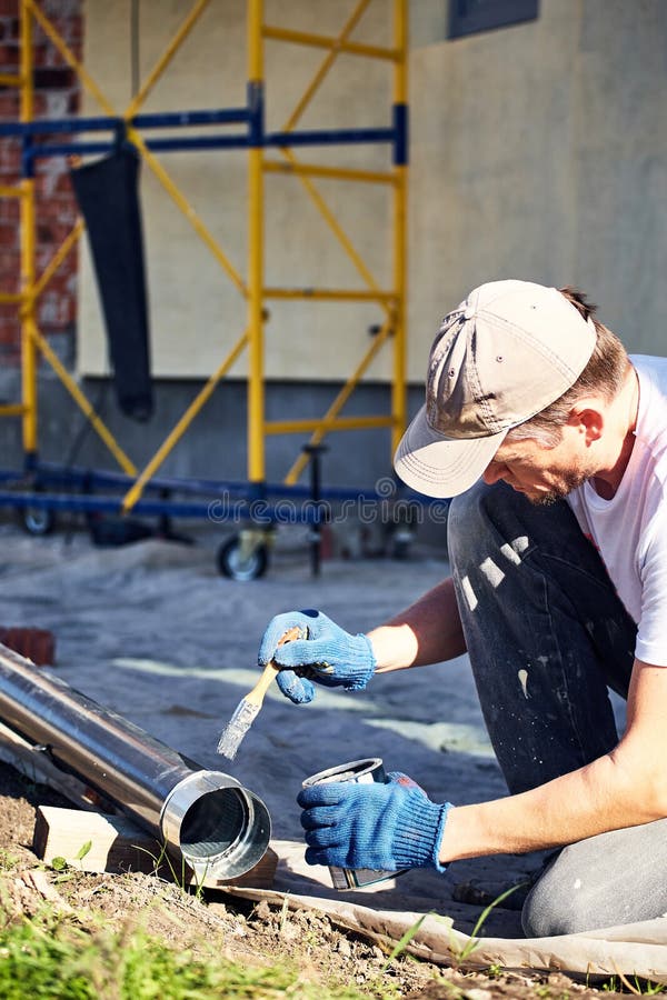 Builder at the Finish House Working with the Tool. Stock Photo - Image ...