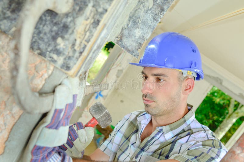 Builder Fixing Metal Tie To Wall Stock Photo - Image of handle, site ...