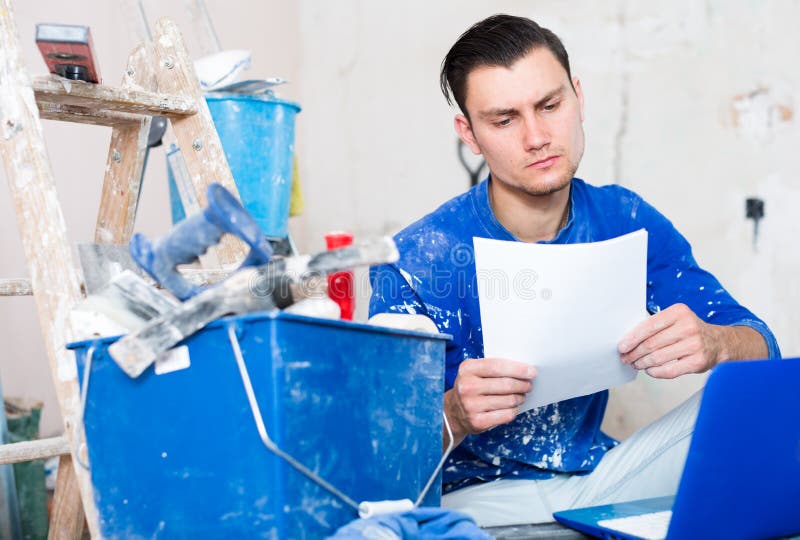 Builder Foreman with Laptop and Blueprint Paper Stock Photo - Image of ...