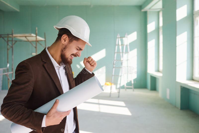 Builder Foreman in a White Helmet Surprised in Shock at a Construction ...
