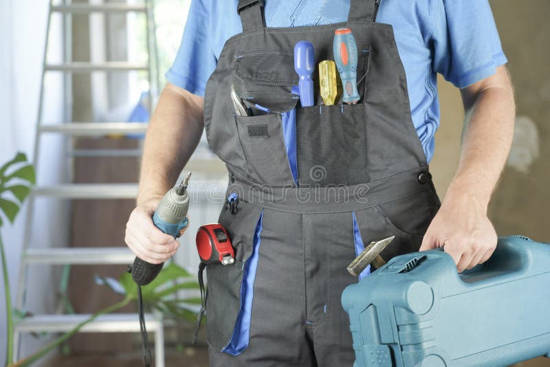 Builder Guy Holds a Toolbox and a Cordless Screwdriver Stock Image ...