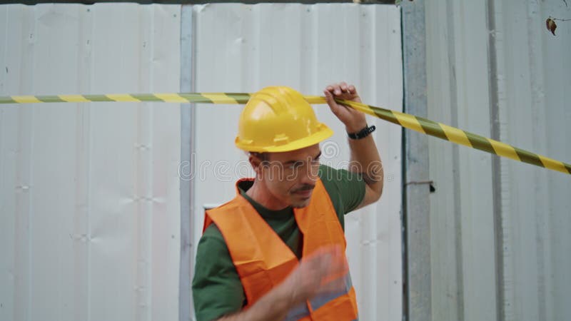 Builder Guy Passing Tape at Construction Site Closeup. Man Taking Off ...