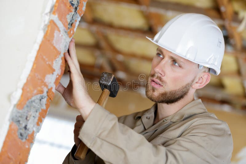 Builder with hammer stock photo. Image of measure, fixing - 32237164