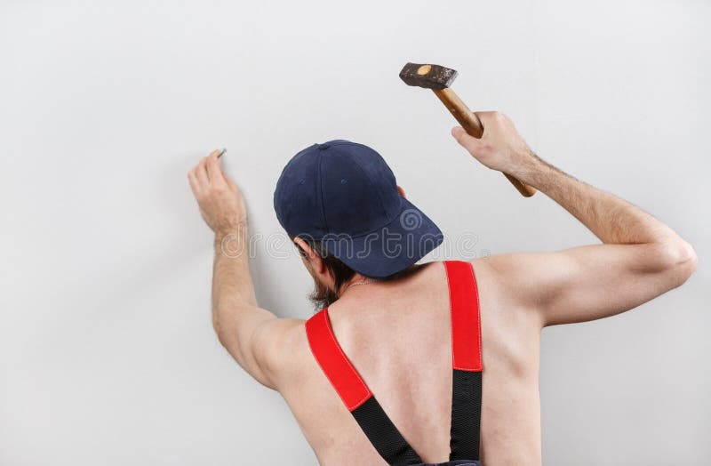 Builder with hammer stock photo. Image of concept, casual - 252845154