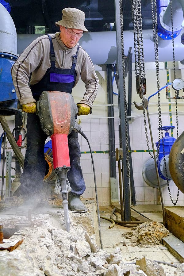 Builder with a hammer stock image. Image of pneumatic - 107249343