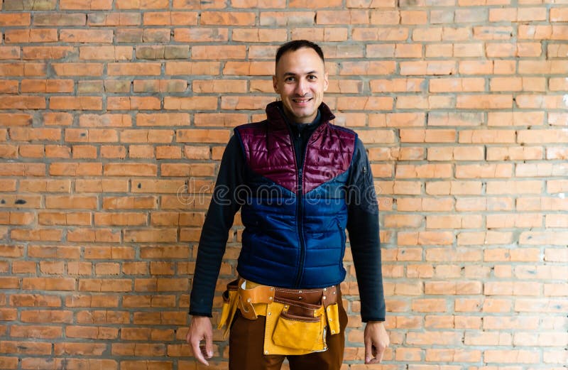 Builder Handyman with Construction Tools. House Renovation Background ...