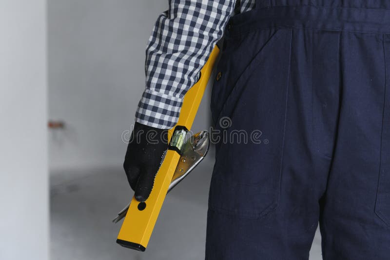 Builder Handyman with Construction Tools. House Renovation Background ...