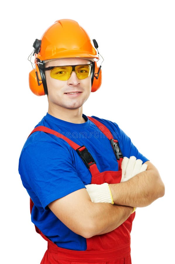 Builder in Hard Hat, Earmuffs and Goggles Stock Image - Image of ...
