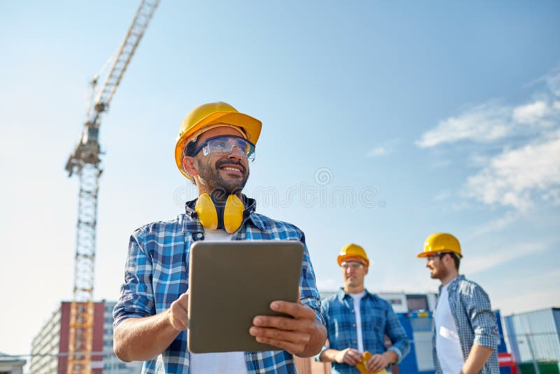 Builder in Hardhat with Tablet Pc at Construction Stock Photo - Image ...