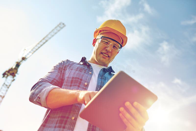 Builder in Hardhat with Tablet Pc at Construction Stock Photo - Image ...