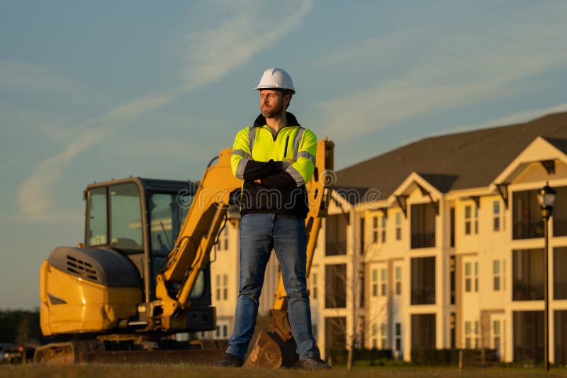 Builder in Helmet on the Construction Site. Stock Photo - Image of ...