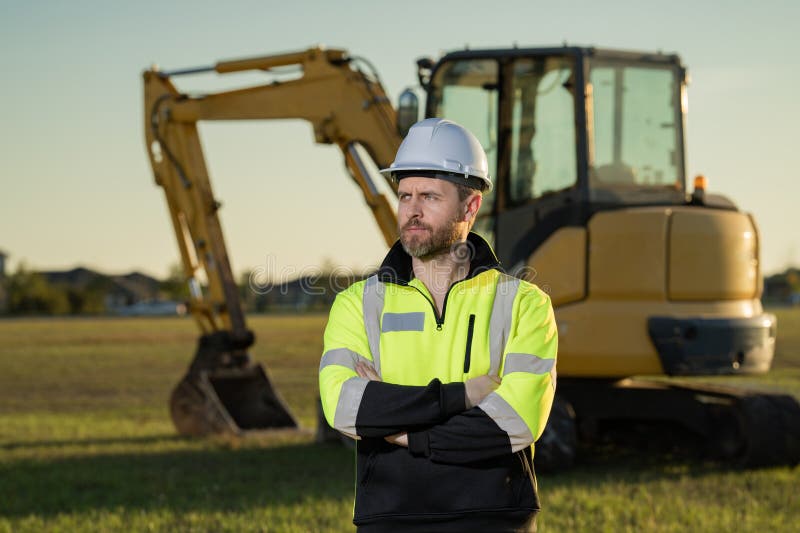 Builder in Helmet on the Construction Site. Stock Photo - Image of ...