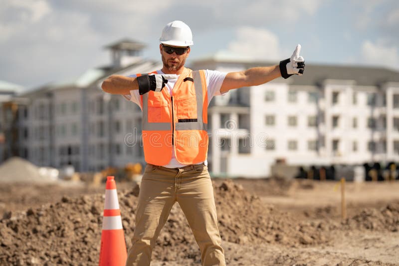 Builder in Helmet on Construction Site. Construction Engineer Worker in ...
