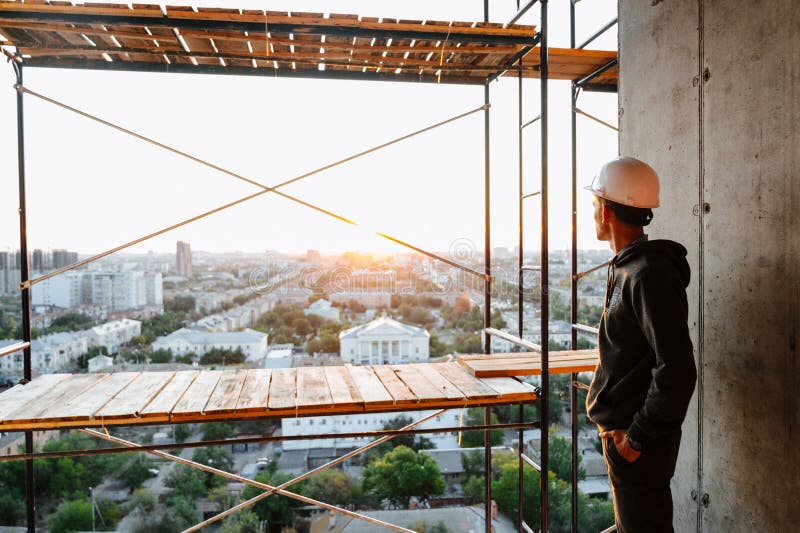 Hard Hat Builder Inside Building Under Construction Stock Photo - Image ...